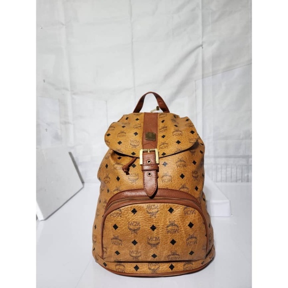 MCM | Bags | Authentic Mcm Vintage Logo Print Coated Canvas Backpack ...